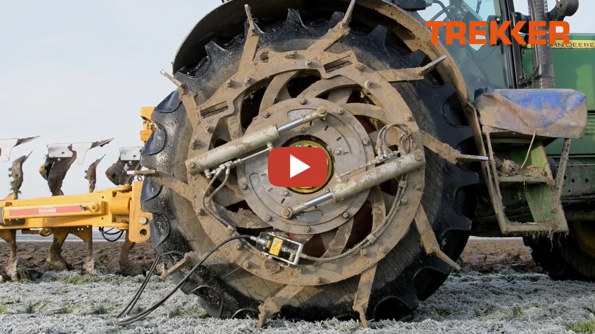 Non-slip wheels next to rear wheels of a tractor -- TREKKER