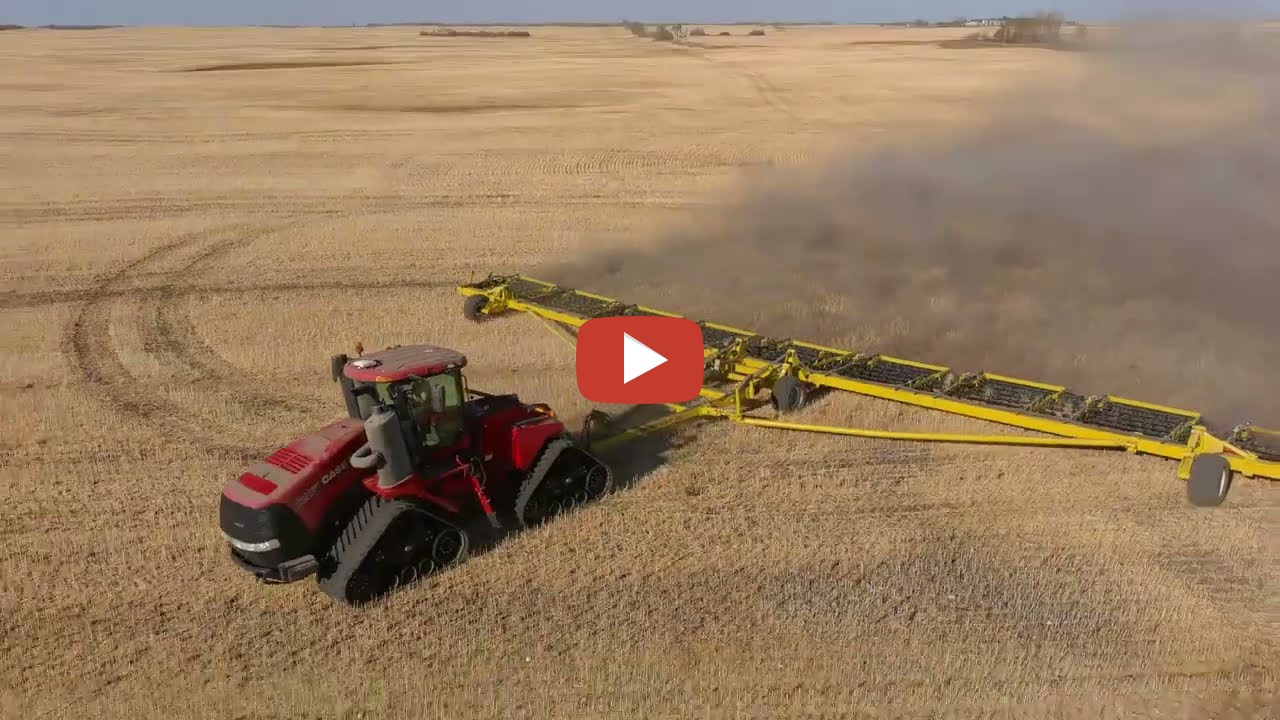 Case IH 620 Quadtrac pulling a Degelman Strawmaster + 90ft Heavy Harrow in Canola Stubble going ...