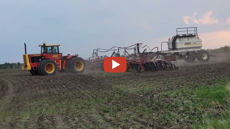 Seeding yellow mustard with a Versatile tractor-- Plant 23 is done ...