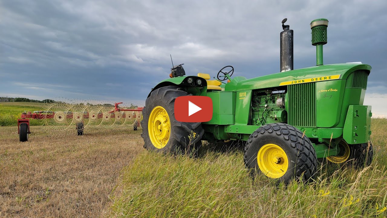 South Sask Farmer -- John Deere 5010 back In action!! Mowing, raking ...