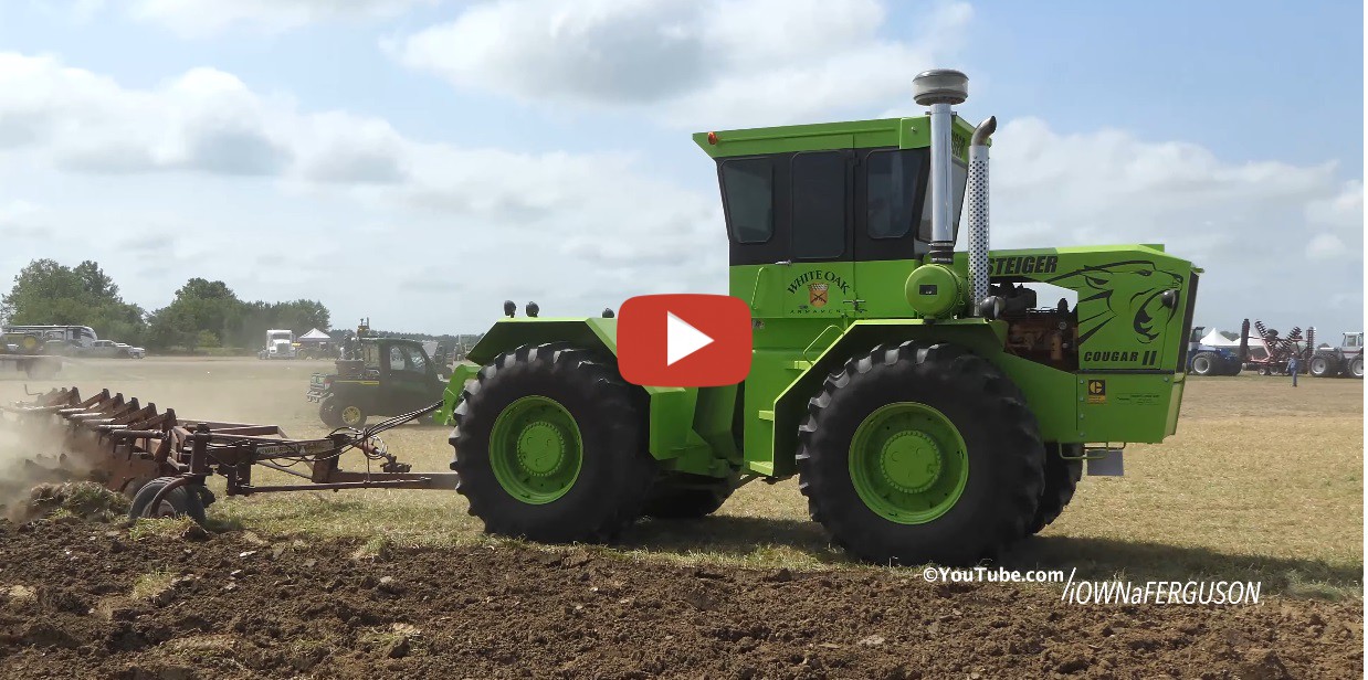 Great looking Steiger Cougar 2 in the field plowing with an 8-bottom ...