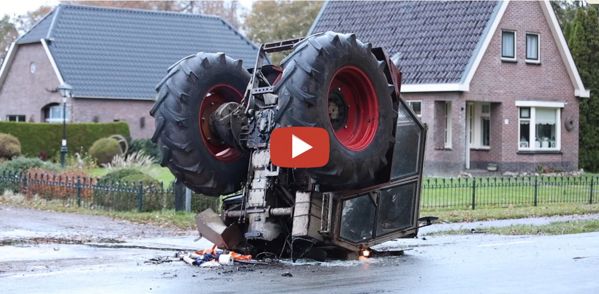 Tractor breaks in two on the road in Belgian after colliding with a car ...