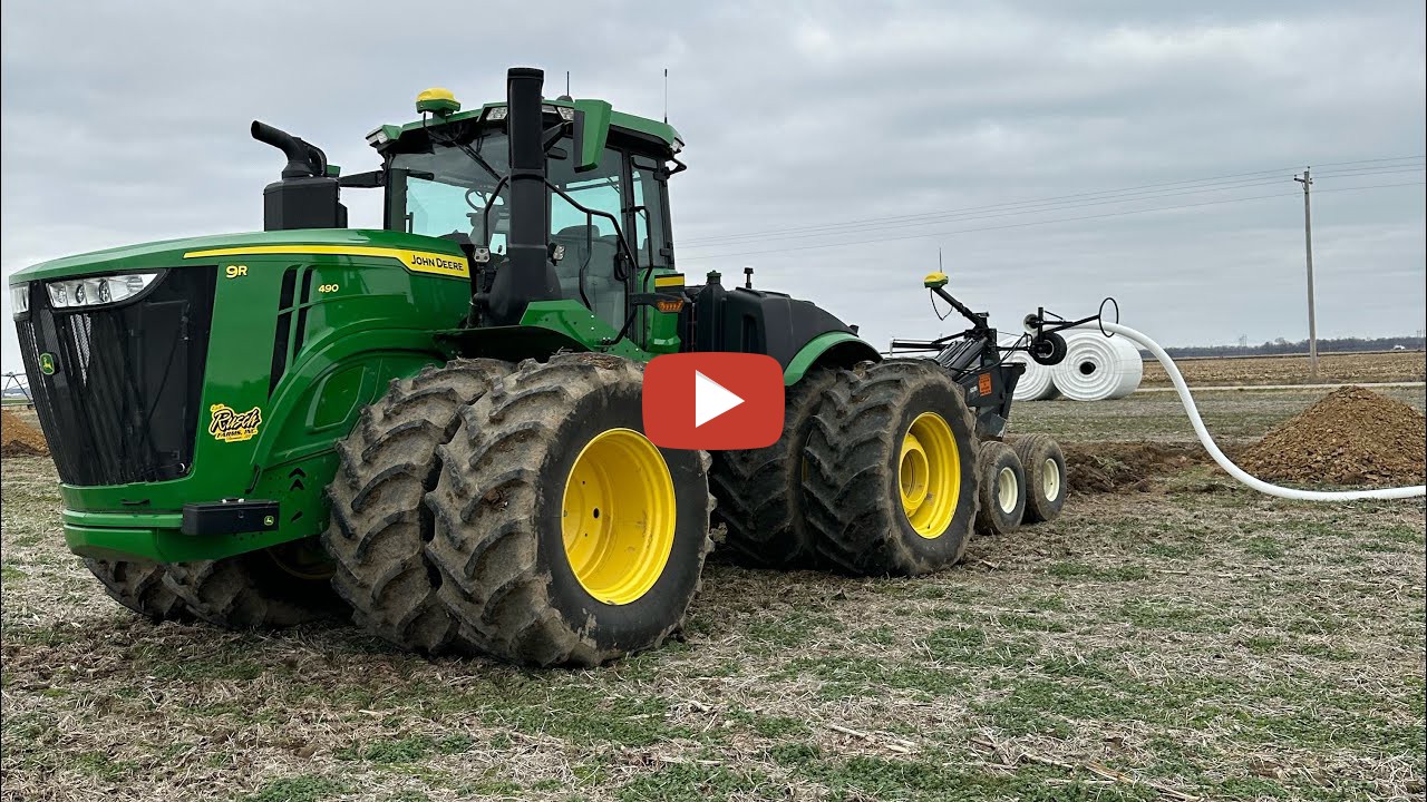 Laying tile with a soil max tile plow with big John Deere tractors ...
