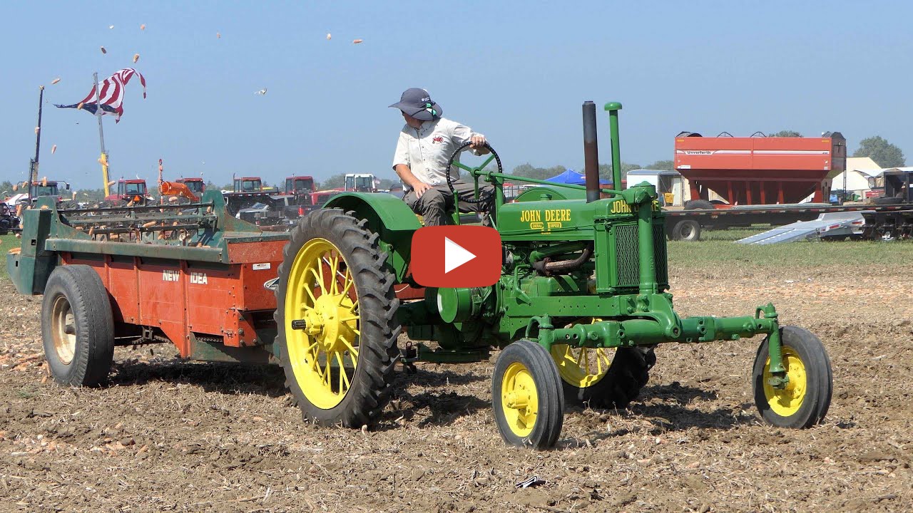 At the 2023 edition of Half Century of Progress Show. Two tractors in the field spreading ...