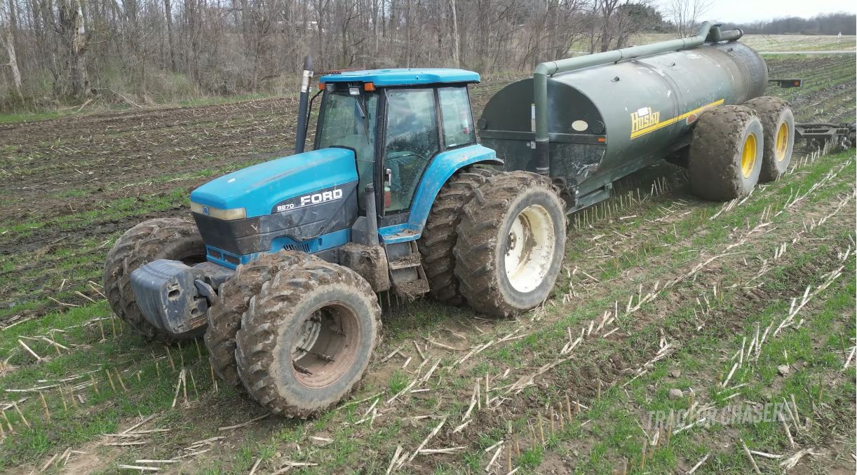 Watch as a Ford 8970 and John Deere 8320 team up to pull 8000 gallon ...
