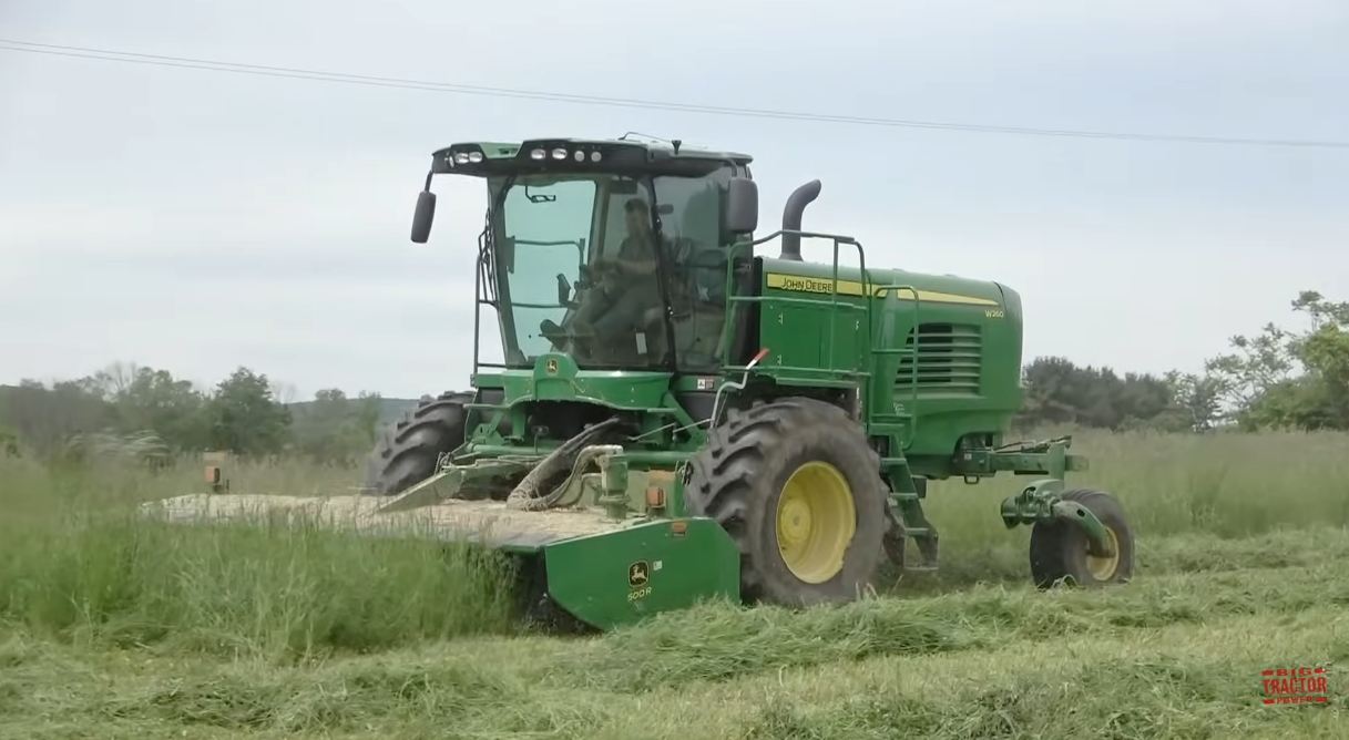 Big Tractor Power is out in the field with a 260 hp JOHN DEERE W260 Windrower mowing hay with a ...