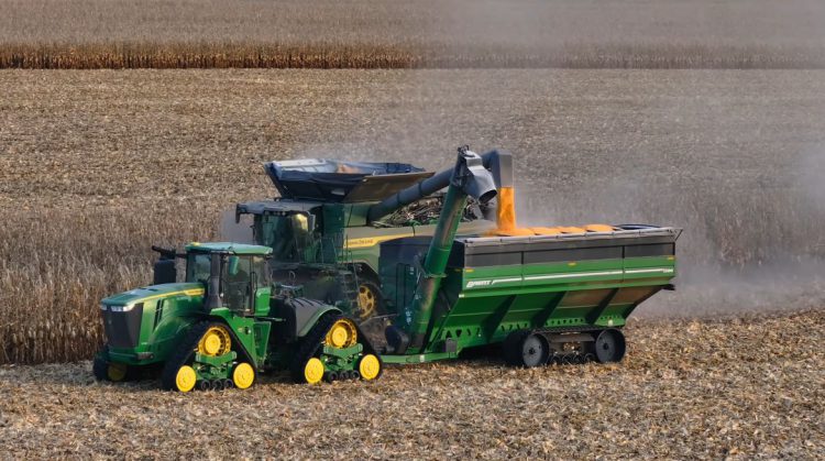 In this video the crew runs two John Deere X9 1000 combines, each ...
